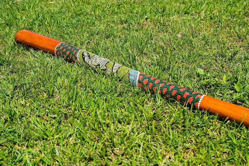 Didgeridoo on the grass stock image. Image of music, graphic - 94220649