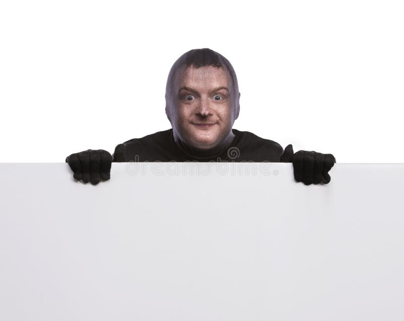 Dief in zwart masker stock foto. Image of donker, aanplakbord - 51792840