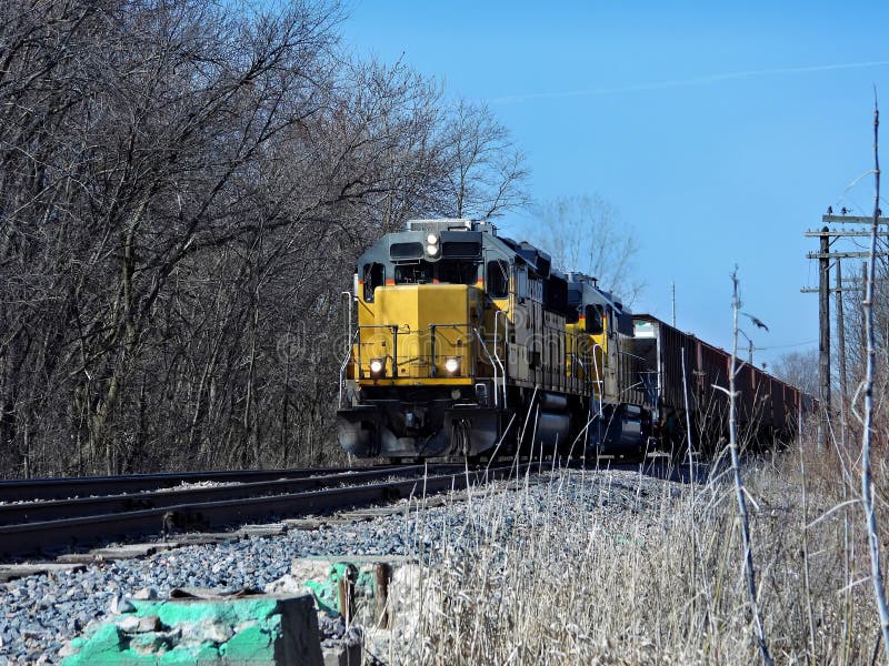 Diesel Locomotive Pulling a Freight Train of Grain Cars Editorial ...