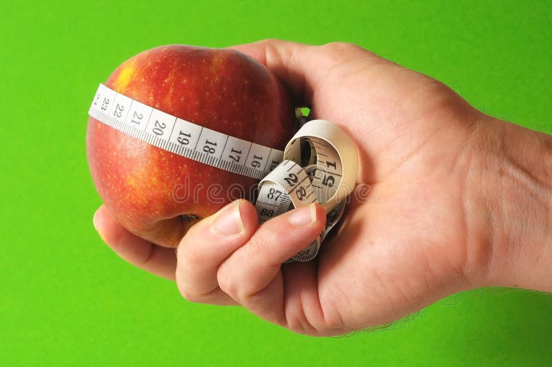 Diet Apple and Meter on the Hand Stock Photo - Image of overweight ...