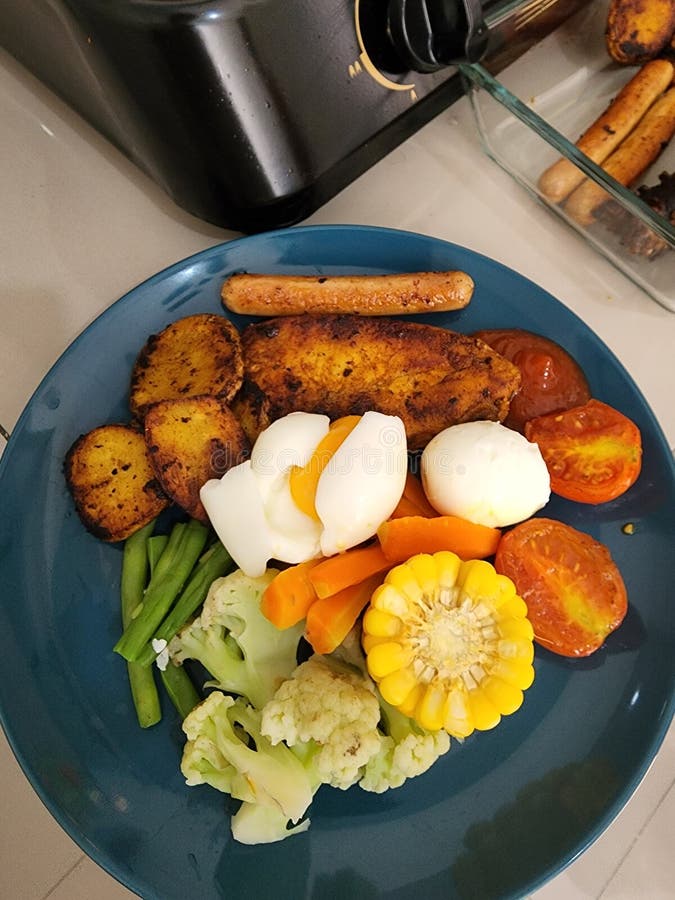 Diet Menu with Corn Sausage Boiled Eggs Tomatoes Wedges Carrot Stock ...