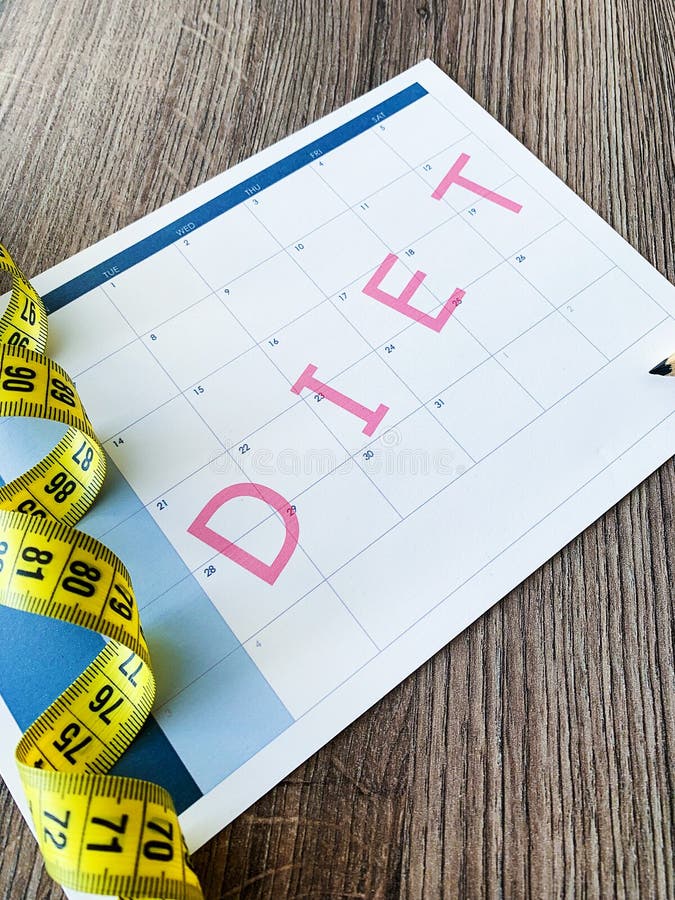 Diet Plan Concept. Measuring Tape and Diet Plan on Wooden Background ...