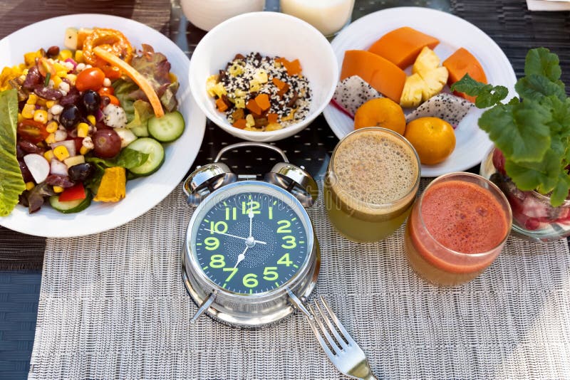 Diet Plan Program with Alarm Clock As Interval Fasting Diet Concept ...