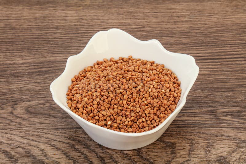 Raw BuÑ kwheat Cereal in the Bowl Stock Photo - Image of grain, heap ...