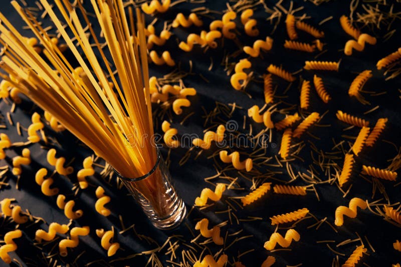 Difference Types of Pasta and Spaghetti on Black Background. Italian ...