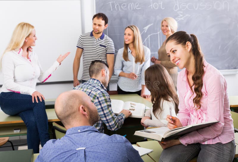 Different Age Students during Break Stock Photo - Image of girl, giving ...