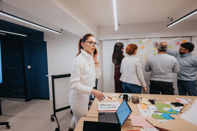 Different Aged, Business Professionals Collaborating and Sharing Ideas ...