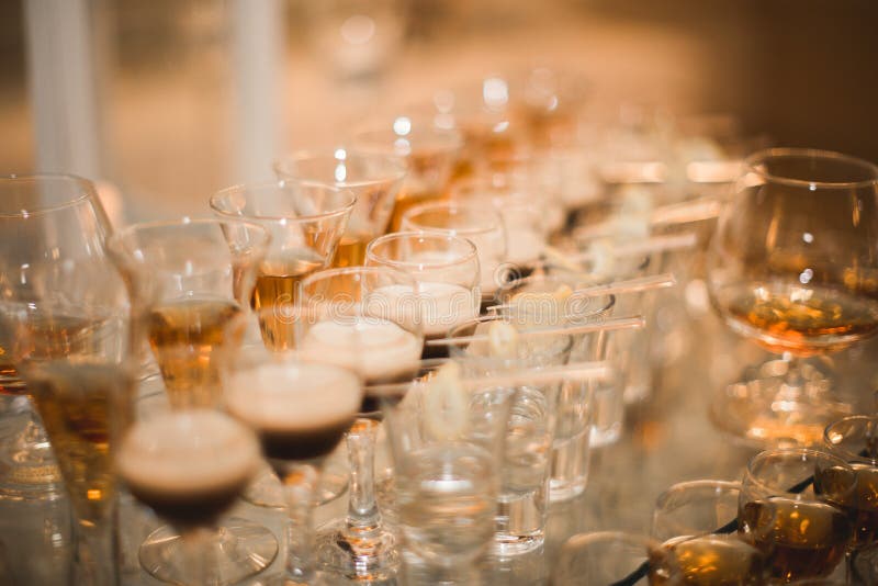 Different Alcohol Drinks in Goblets and Wine Glasses on Wedding Buffet ...