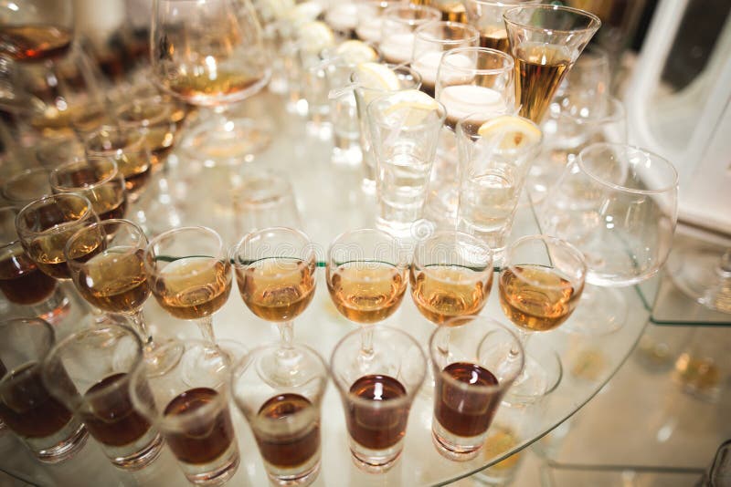 Different Alcohol Drinks in Goblets and Wine Glasses on Wedding Buffet ...