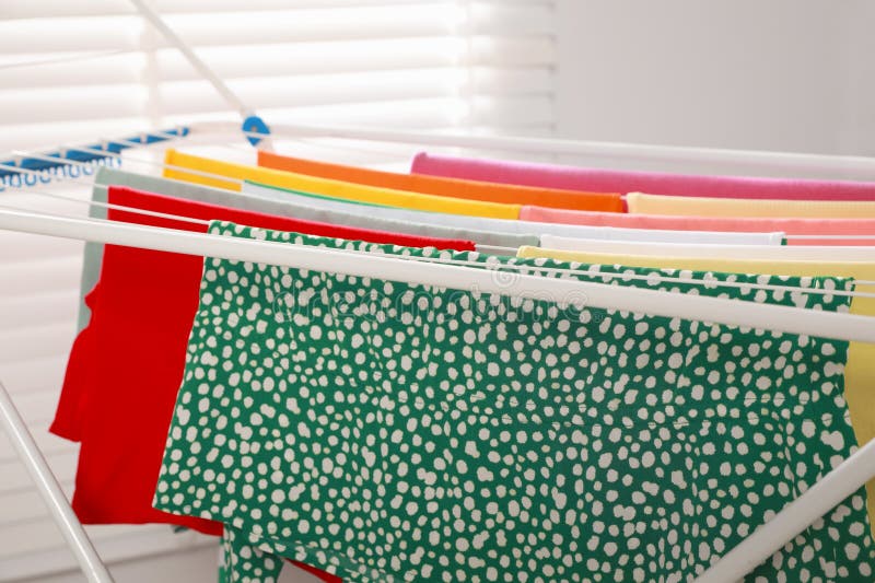 Different Apparel Drying on Clothes Airer Indoors Stock Image - Image ...