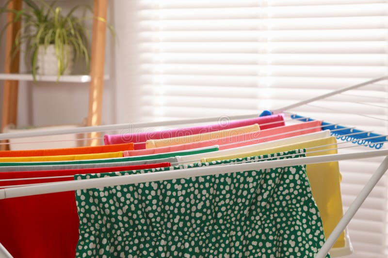 Different Apparel Drying on Clothes Airer Indoors Stock Image - Image ...