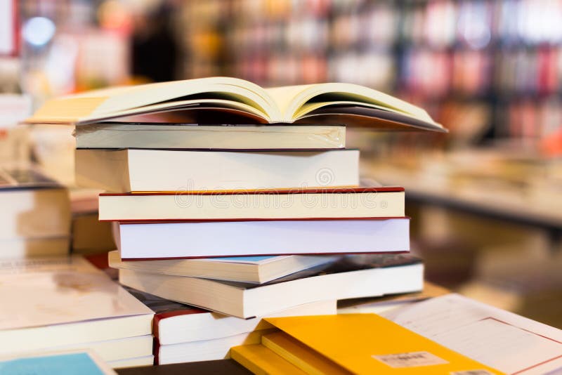 Different Books Lying on Table in Library Stock Photo - Image of ...