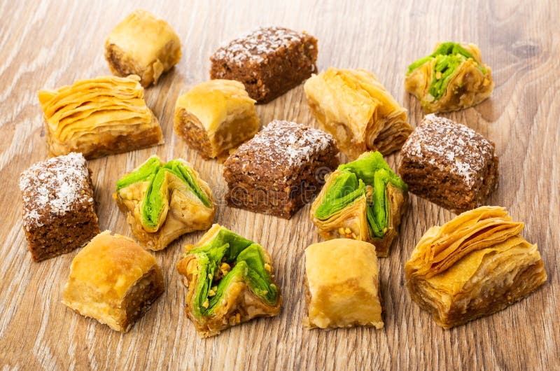 Different Baklava Scattered on Table Stock Photo - Image of sweets ...