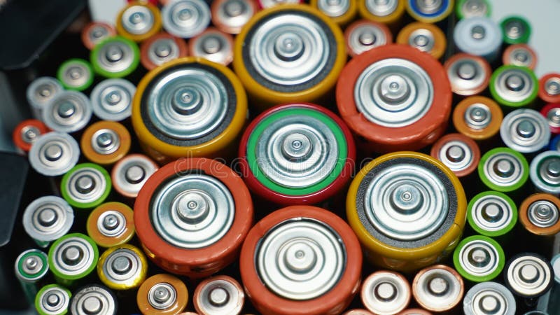 Different Battery Types Rotate in a Circle. Old Used Batteries Stock ...