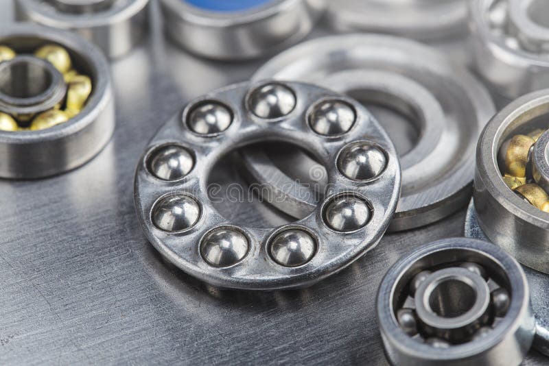 Different Bearings on a Metal Background. Part of Mechanism Stock Photo ...