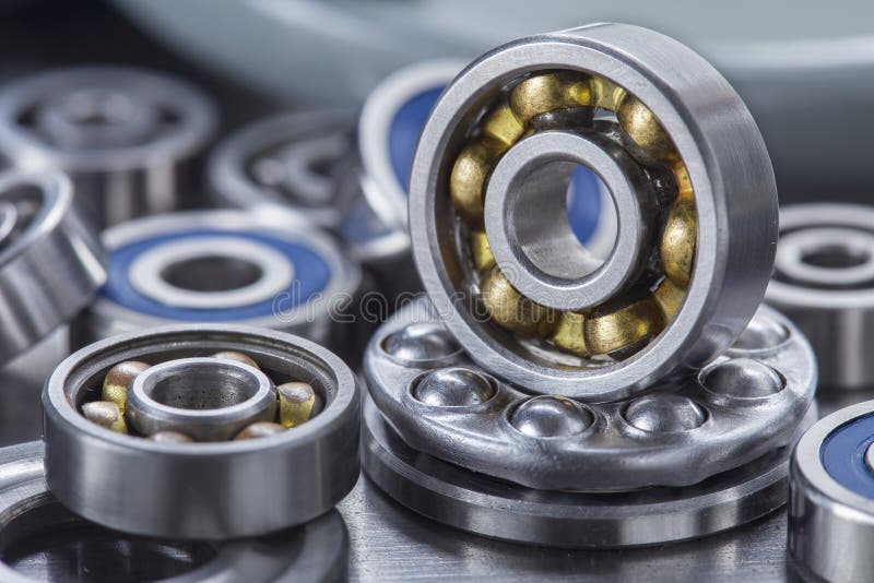 Different Bearings on a Metal Background. Part of Mechanism Stock Photo ...