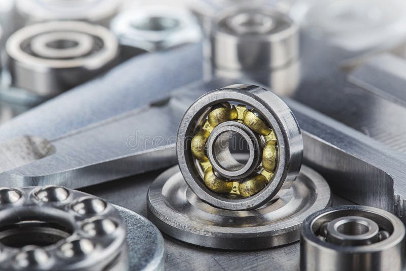 Different Bearings, Vernier Caliper and Ruler on Metal Background. Part ...