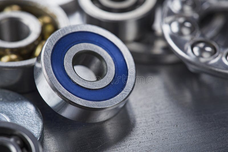 Different Bearings, Vernier Caliper and Ruler on Metal Background. Part ...