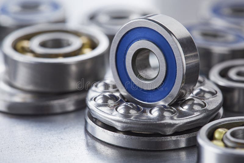 Different Bearings, Vernier Caliper and Ruler on Metal Background. Part ...