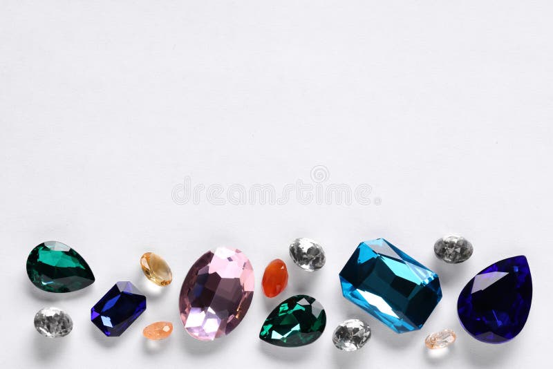 Different Beautiful Gemstones for Jewelry on White Background, Top View ...