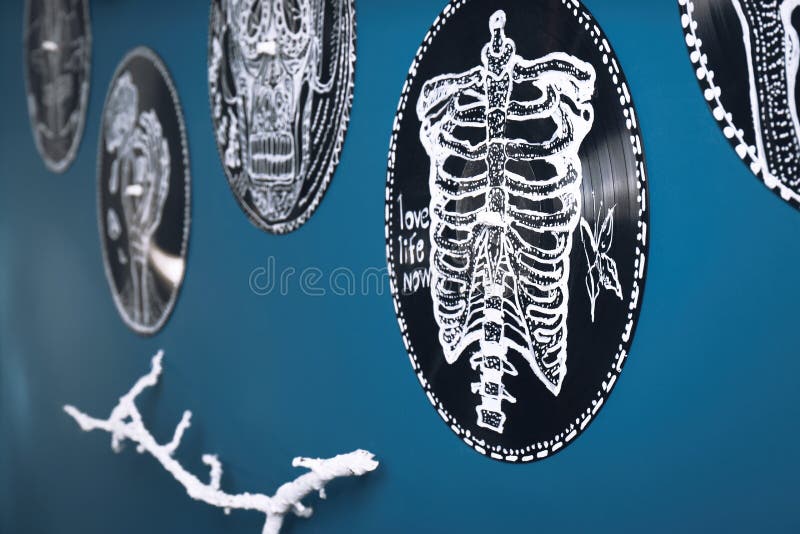 Different Beautiful Halloween Decorations on Blue Wall Stock Image ...