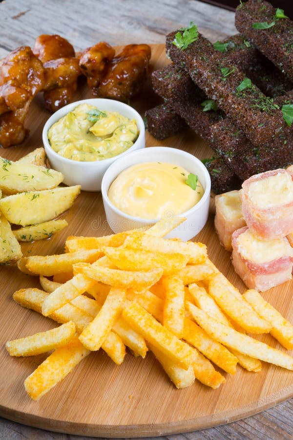 Different beer snacks stock image. Image of board, mustard - 93385059