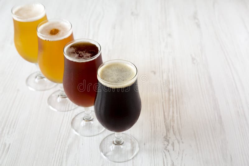 Different beers in a bar stock photo. Image of mugs, beers - 51776438