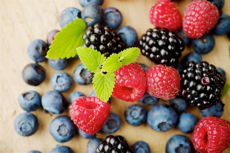 Different berries stock image. Image of summer, wooden - 75684209