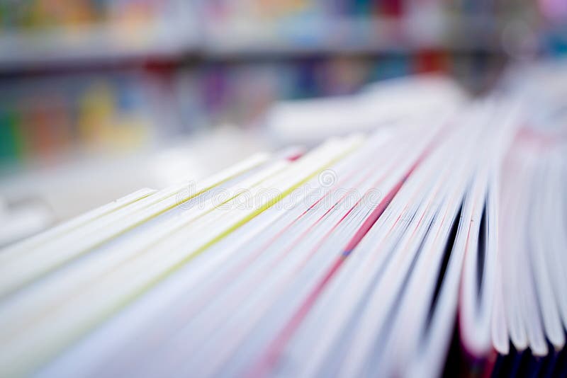 Different Books Lying on the Shelves in the Book Store Stock Photo ...