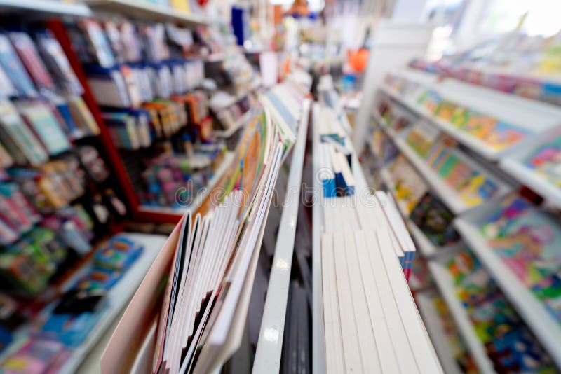 Different Books Lying on the Shelves in the Book Store Stock Photo ...
