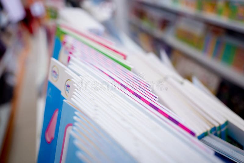 Different Books Lying on the Shelves in the Book Store Stock Photo ...