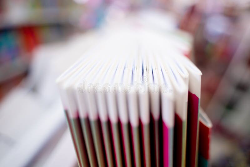 Different Books Lying on the Shelves in the Book Store Stock Photo ...