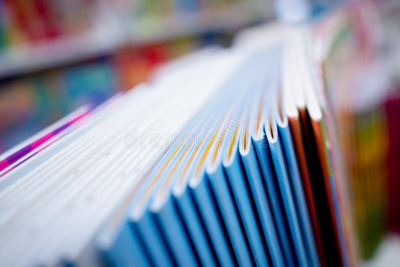 Different Books Lying on the Shelves in the Book Store Stock Photo ...