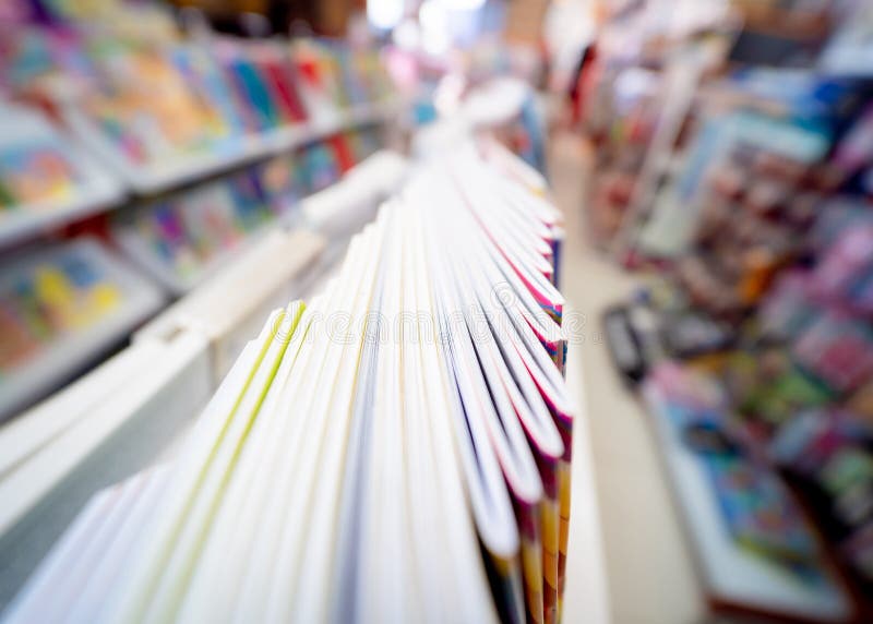 Different Books Lying on the Shelves in the Book Store Stock Photo ...