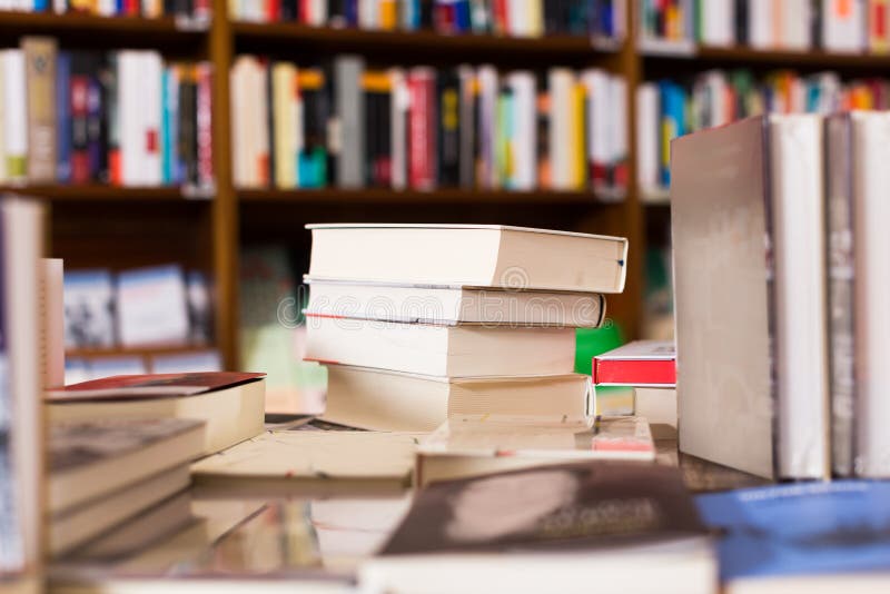 Different Books Lying on Table in Library Stock Photo - Image of ...