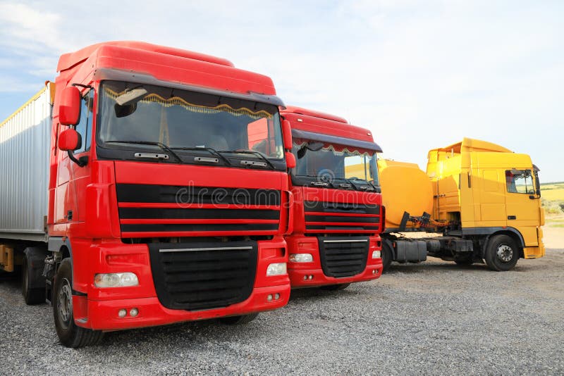 Different Bright Trucks Parked Outdoors. Modern Stock Image - Image of ...