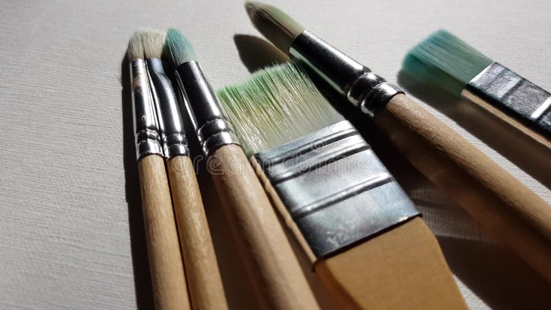 Different Brushes for Painting on the White Canvas, Side View Closeup ...