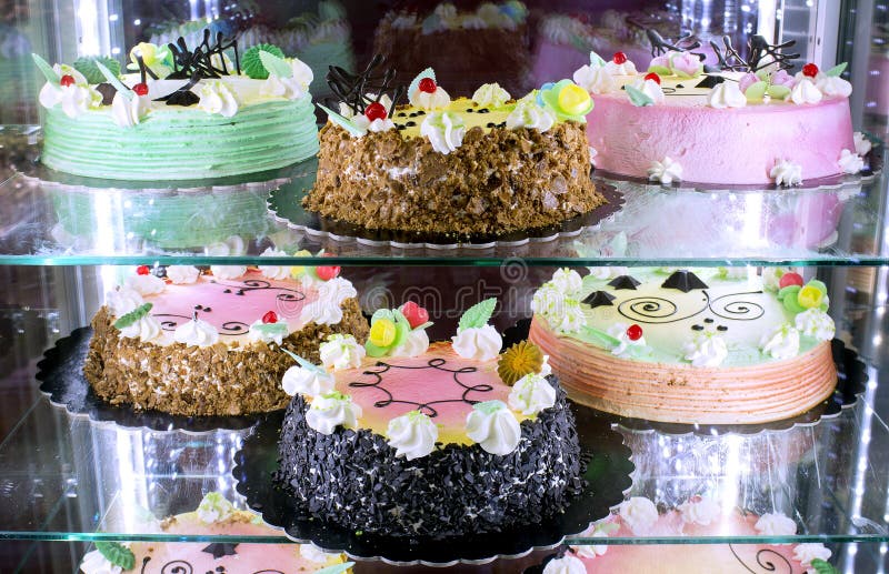 Different Cakes in a Display of Pastry Stock Photo - Image of party ...