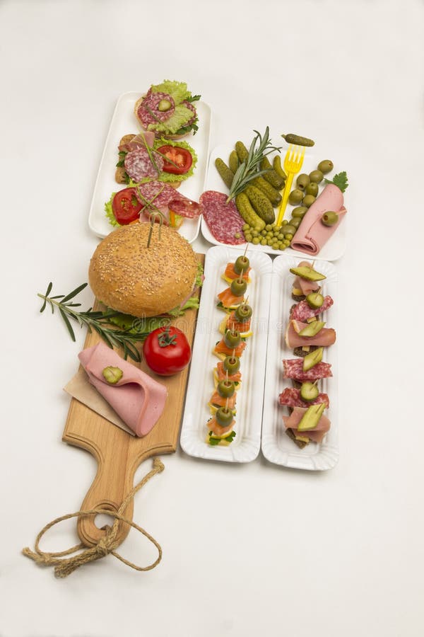 Different Canapes with Salmon, Cucumber, Tomatoes, Cheese, Meat ...