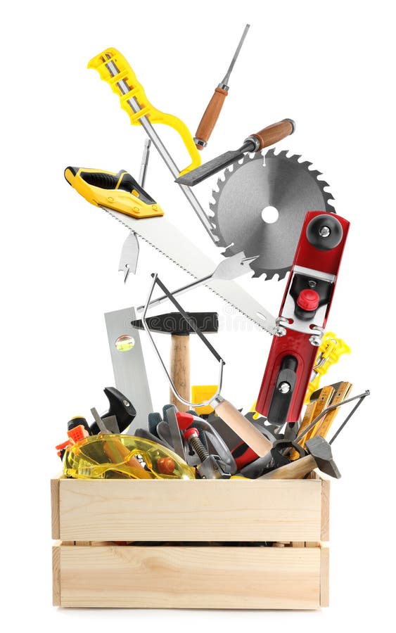Different Carpenter`s Tools Falling into Wooden Box on White Background ...