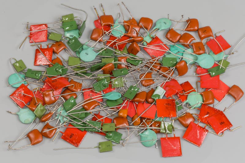 Different Ceramic and Film Fixed Capacitors on a Gray Surface Stock ...
