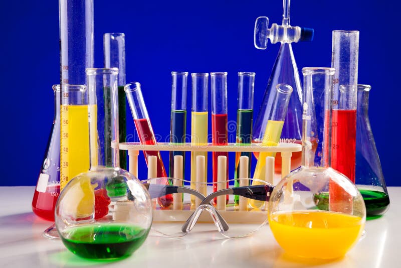 Different Chemistry Lab Set on a Table Over Blue Background Stock Image ...