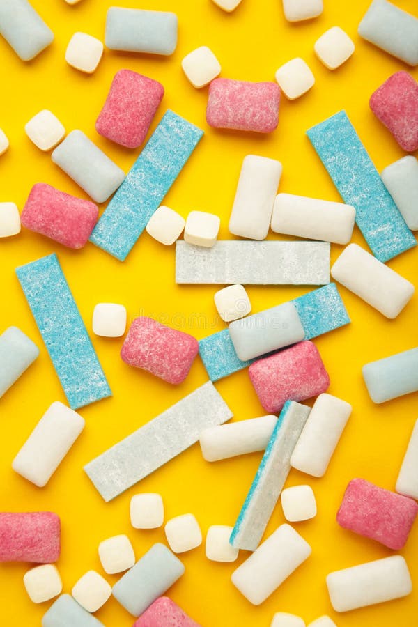 Different Chewing Gums on Blue Background. Vertical Photo Stock Image ...