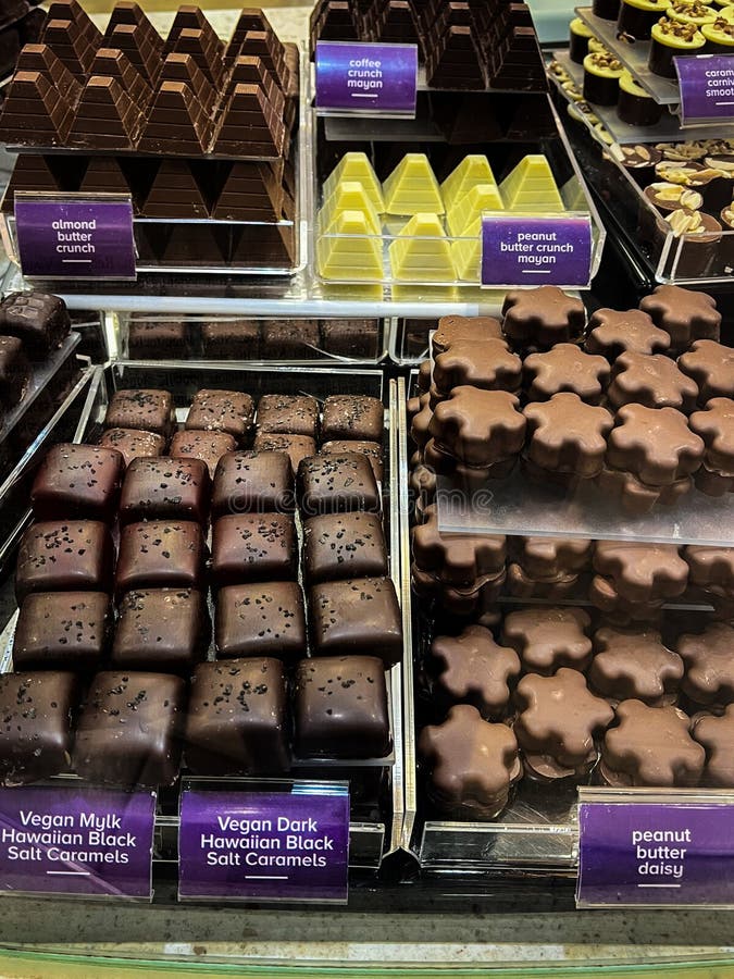 Different Chocolates Closeup in the Store Stock Photo - Image of icing ...