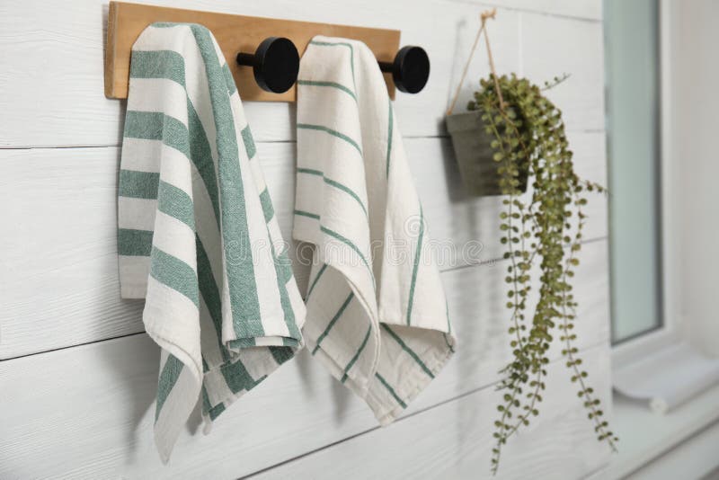 Different Clean Kitchen Towels Hanging on Rack Stock Image - Image of ...