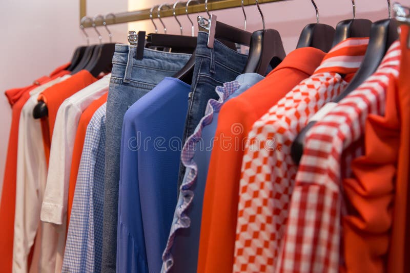 Different Clothes on Hangers Close Up in Store Stock Photo - Image of ...