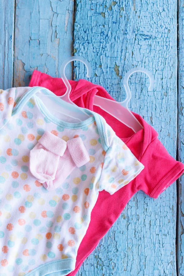 Different Clothes for a Newborn and Socks Stock Image - Image of ...