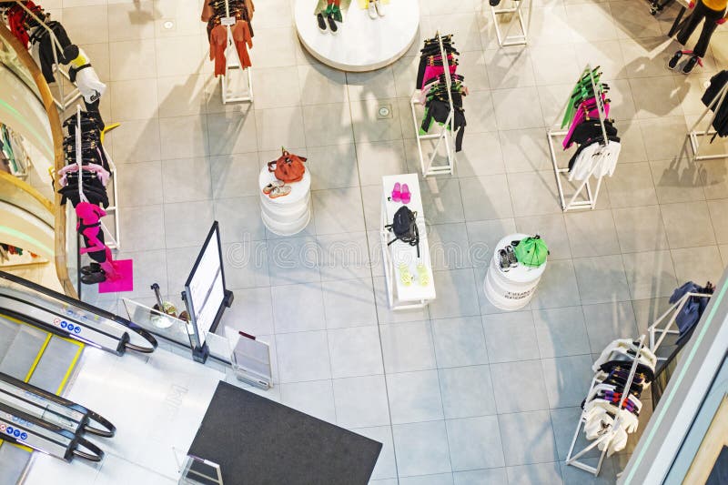 Different Clothes and Shoes in the Interior in the Mall Stock Image ...