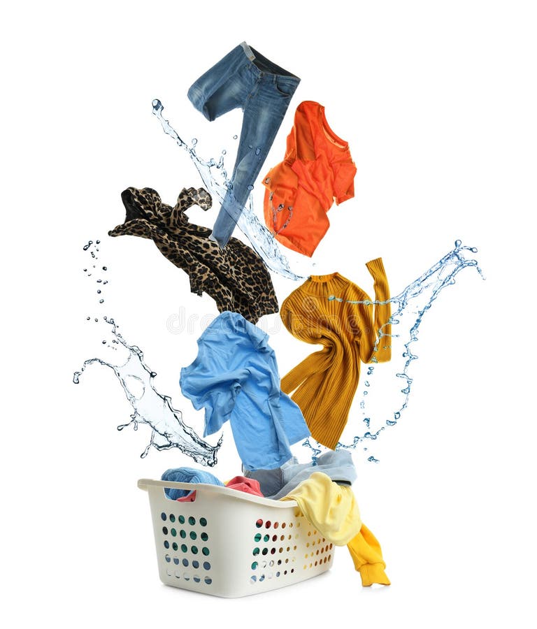 Different Clothes with Water Splash Falling into Laundry Basket Against ...
