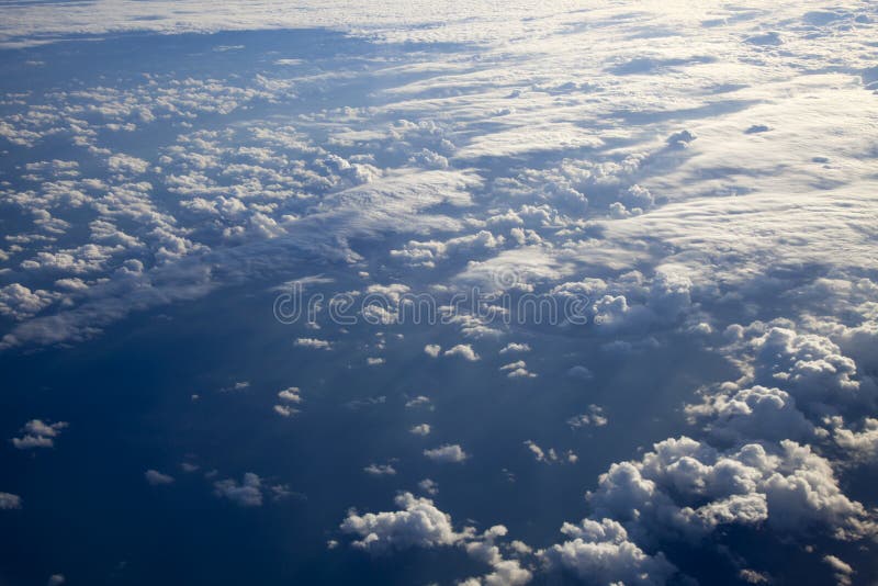 Different Clouds Below, View from a Plane Stock Photo - Image of aerial ...